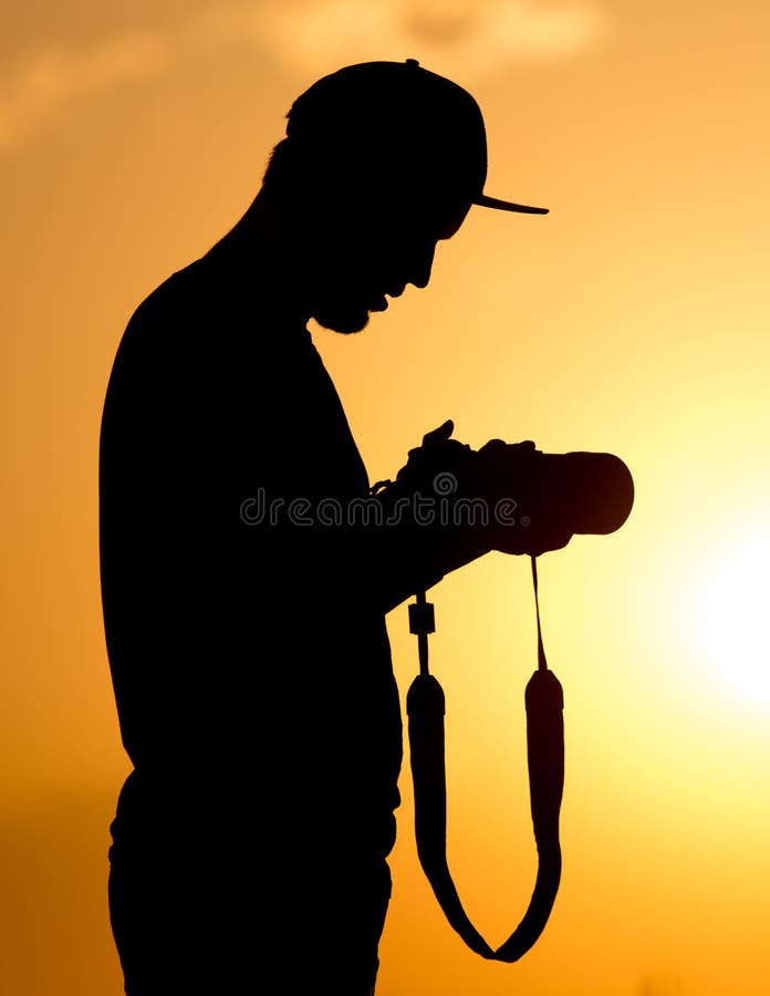 Man Photographer with a Camera at Sunset Stock Image - Image of outdoor ...