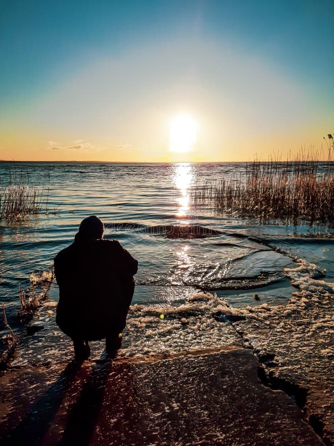 A Man Photographs a Sunset on the Beach Stock Photo - Image of sunset ...