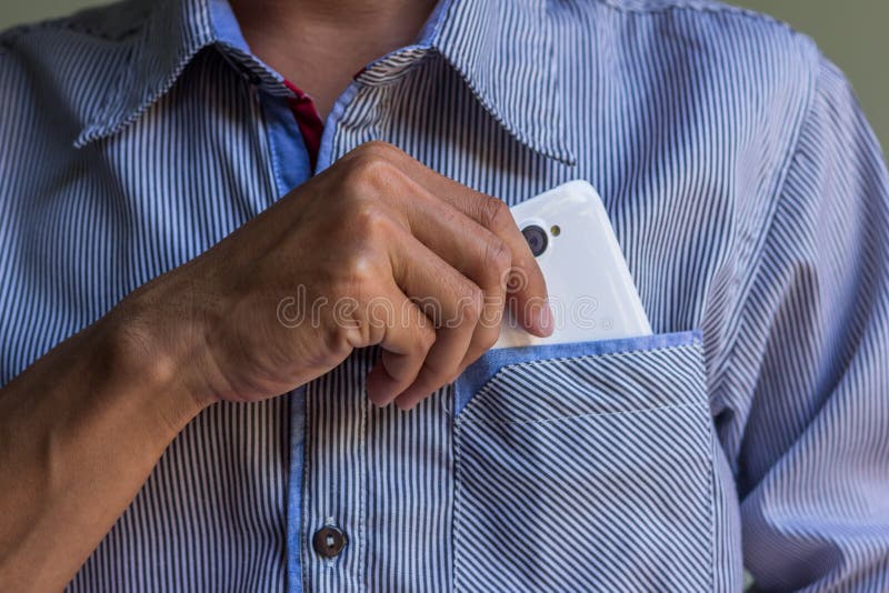 Man pick up smart phone stock photo. Image of people - 47917858