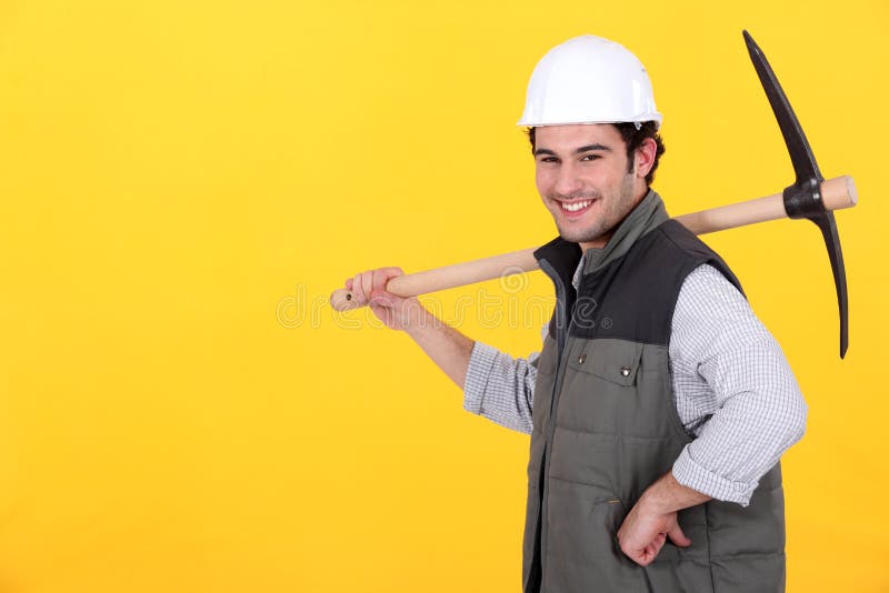 Man with a pickaxe stock image. Image of helmet, mattock - 35913111