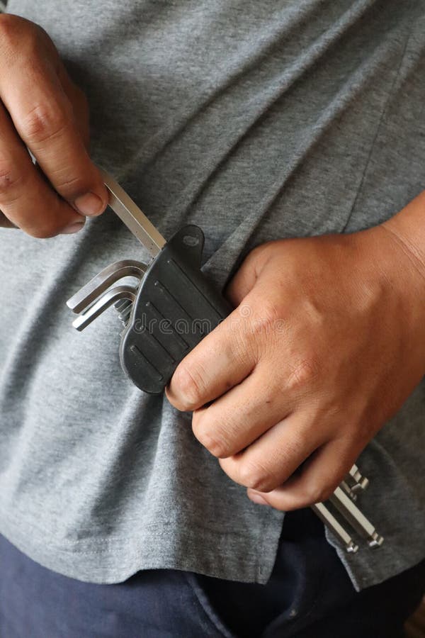 A man is picking his tools stock image. Image of tools - 244709365