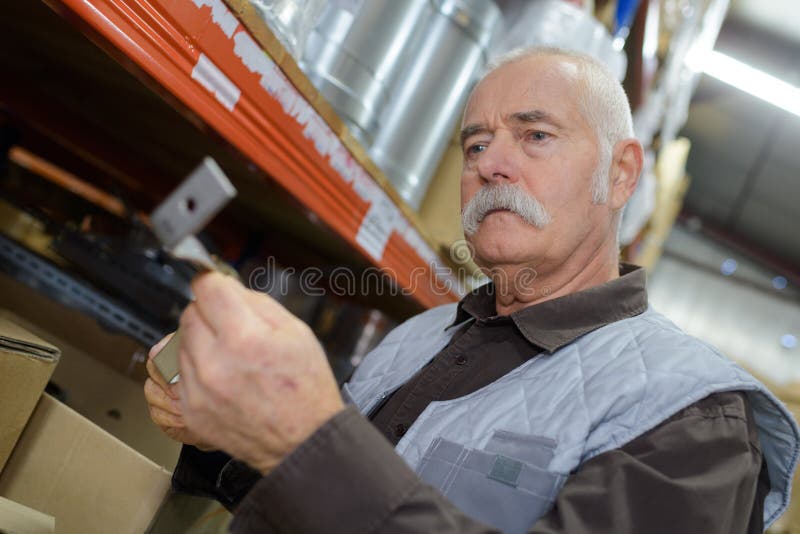 Man Picking Part from Rack in Warehouse Stock Photo - Image of picking ...