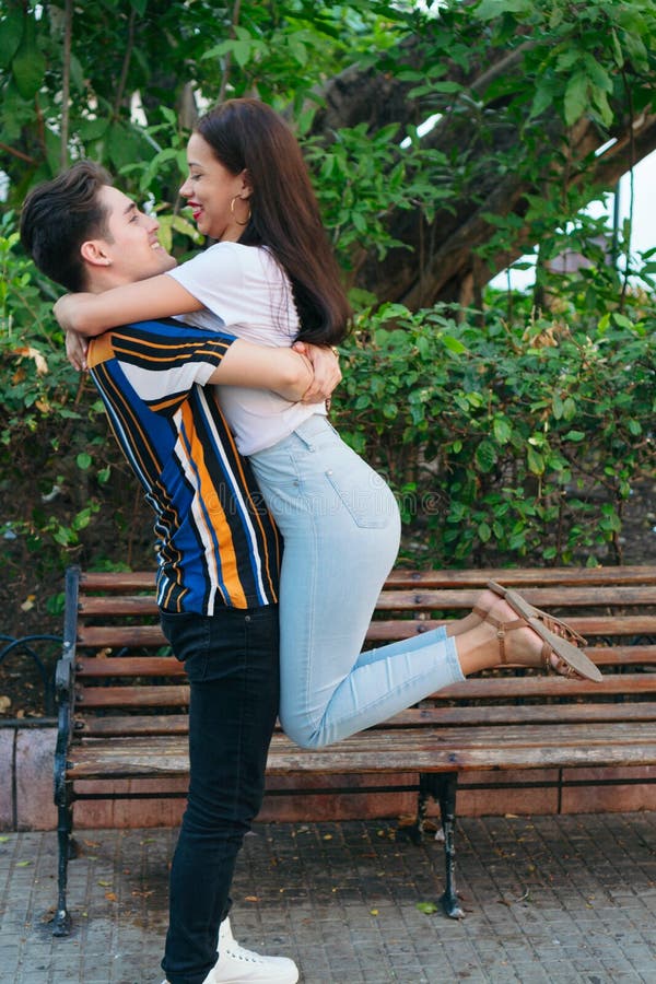 Man Picking Up His Girl and Laughing Stock Photo - Image of females ...