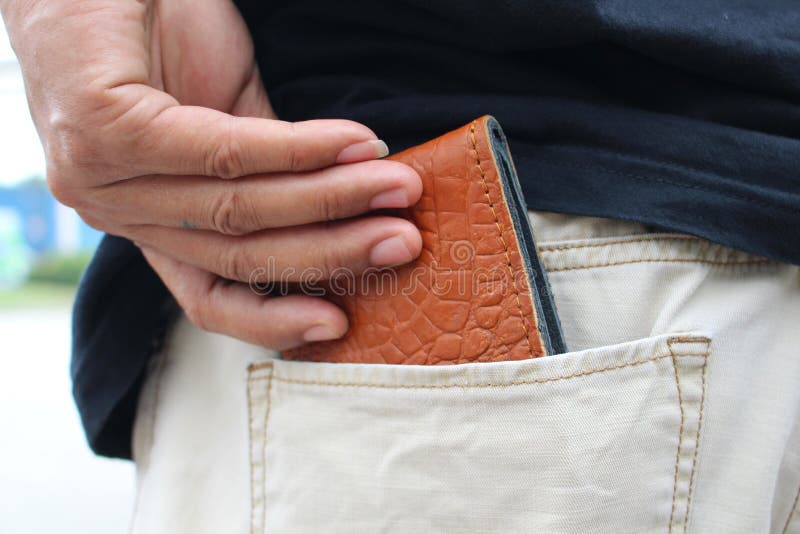 Man picking up wallet stock image. Image of concept, dropped - 66534901