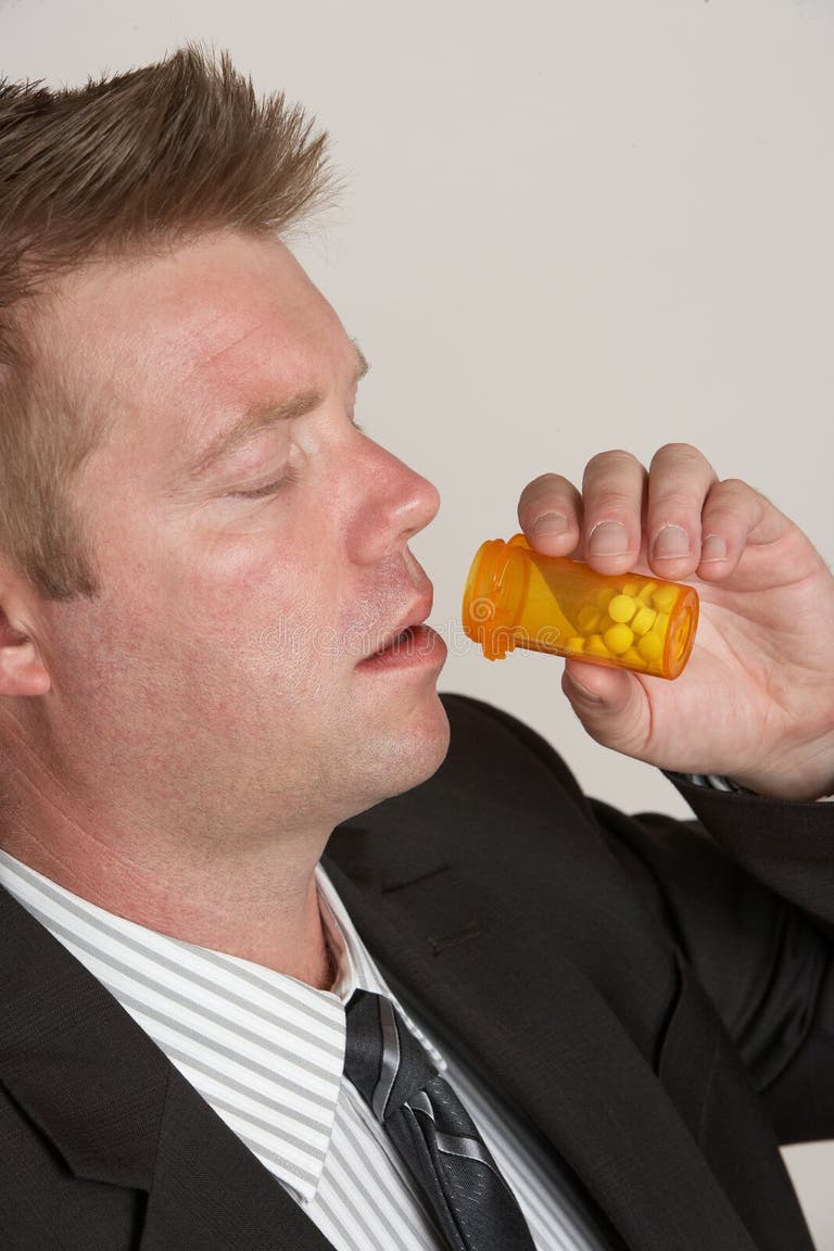Man Eating Pills Pill Bottle Stock Photos - Free & Royalty-Free Stock ...