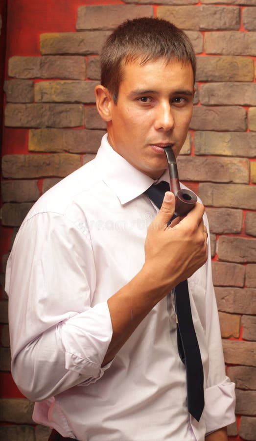 A man with a pipe. stock photo. Image of close, full - 19464578