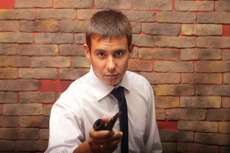 A man with a pipe. stock photo. Image of home, gentleman - 19464596