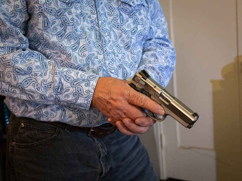 Man with Pistol at Low Ready Position Stock Image - Image of firearm ...