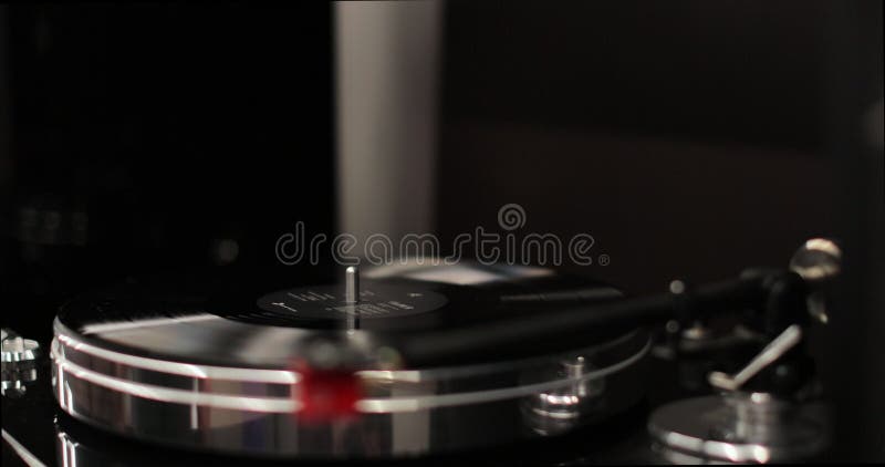 Man Places a Black Disk on a Vinyl Player. Vinyl Record Gets Placed on ...