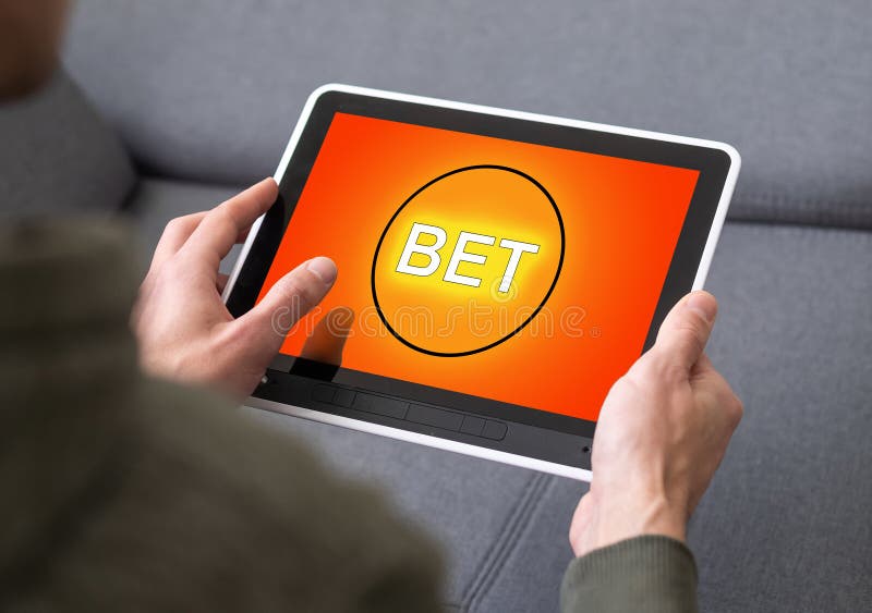 Man Placing Bet with Tablet Computer, Closeup Stock Image - Image of ...