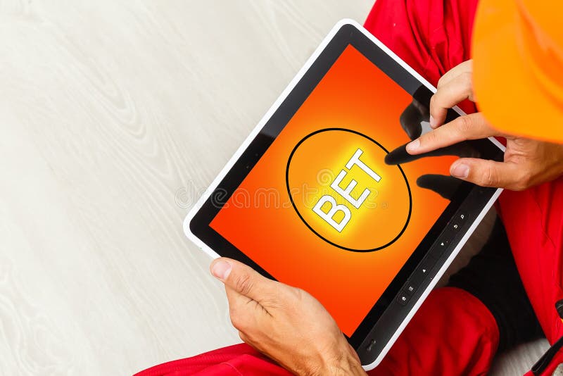 Man Placing Bet with Tablet Computer, Closeup Stock Photo - Image of ...