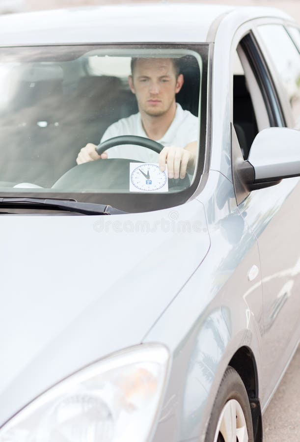 Man Placing Parking Clock on Car Dashboard Stock Photo - Image of ...