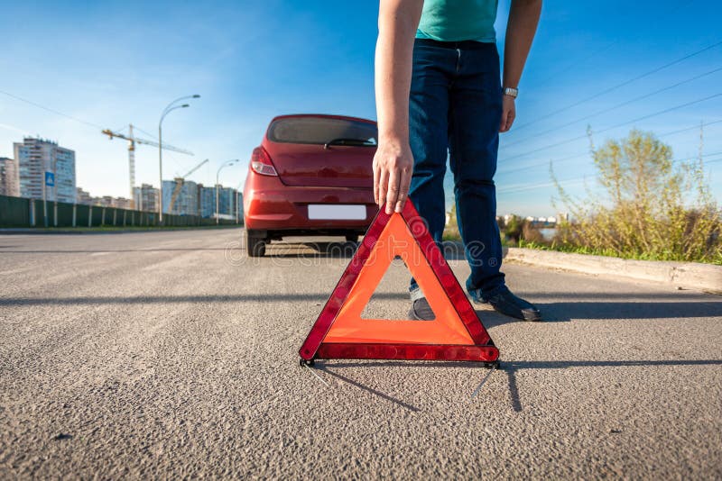 Man Placing Red Triangle Sing on Road after Car Crash Stock Image ...