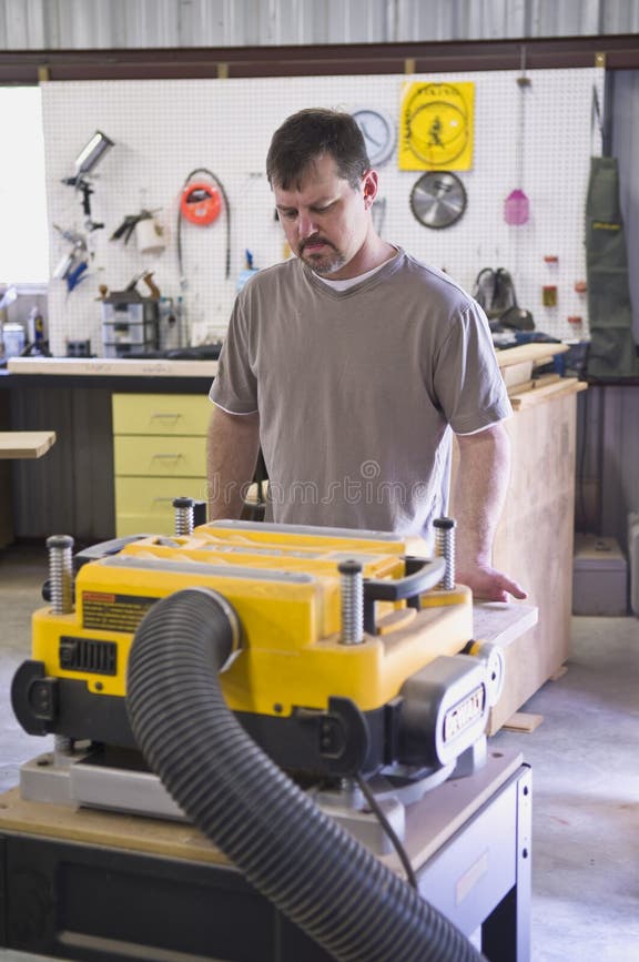 Man Planing Board with Machine Planer Stock Image - Image of tool ...