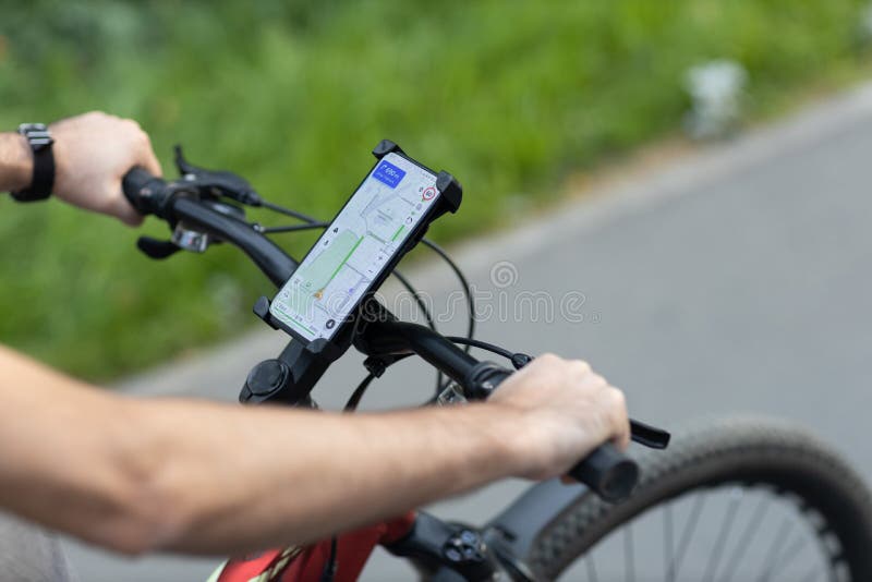 Man Planning Route Using GPS Navigation Application in Mobile Phone on ... Man Planning Route Using GPS Navigation Application in Mobile Phone on ...