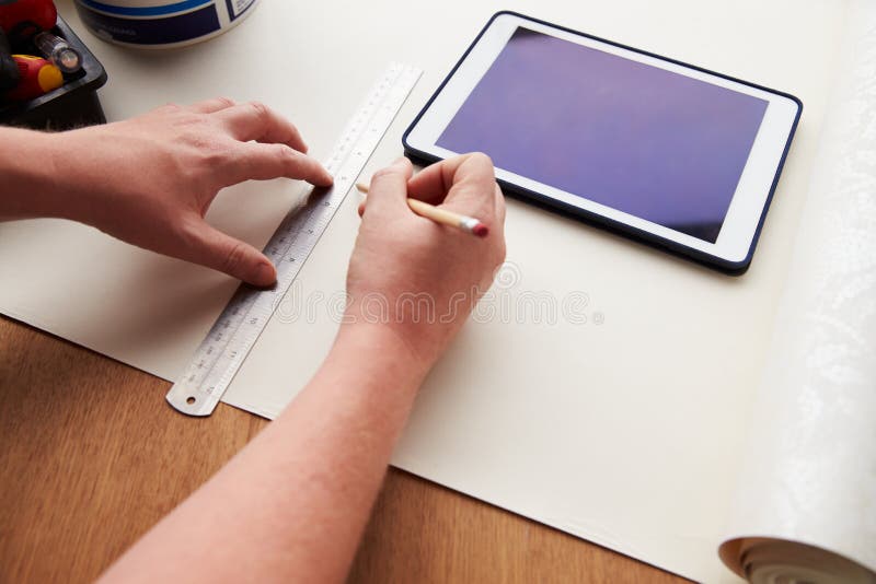 Man Plans Design Project Using Application on Digital Tablet Stock ...