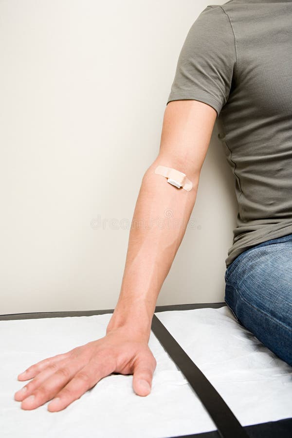 Man with plaster on arm stock image. Image of disease - 62557641