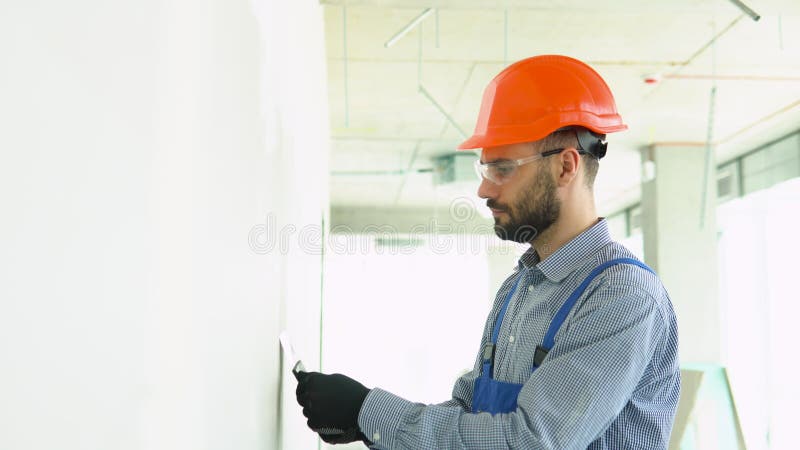 Plasterer Construction Worker, Plastering the Wall Inside the Building ...