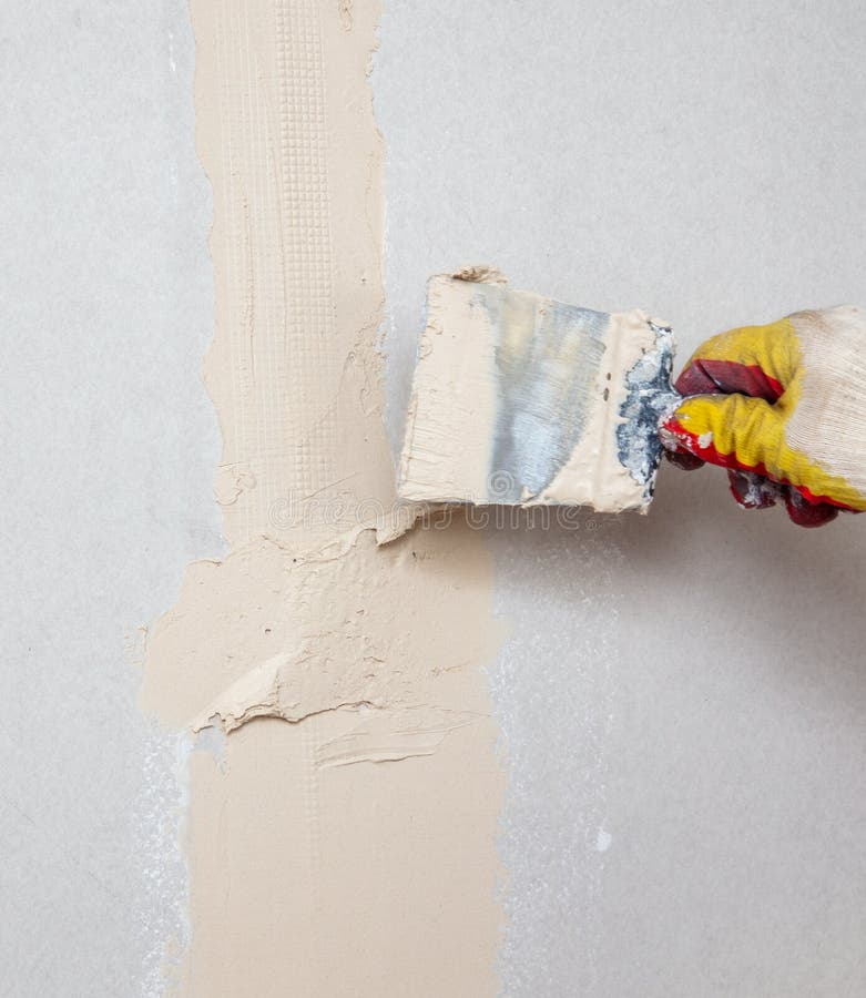 A Man is Plastering a Wall in the House Stock Photo - Image of white ...
