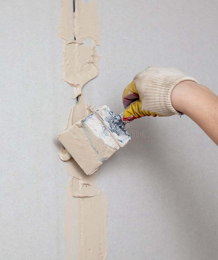 A Man is Plastering a Wall in the House Stock Photo - Image of site ...