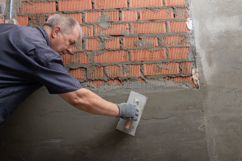 Man Plastering Wall. Worker Makes Renovation Stock Photo - Image of ...