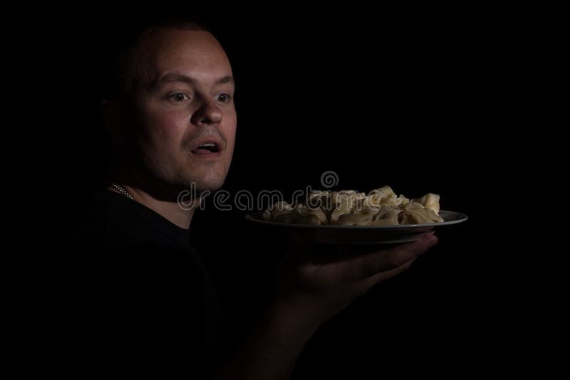 Man with Plate of Dumplings Stock Image - Image of adult, body: 54990829