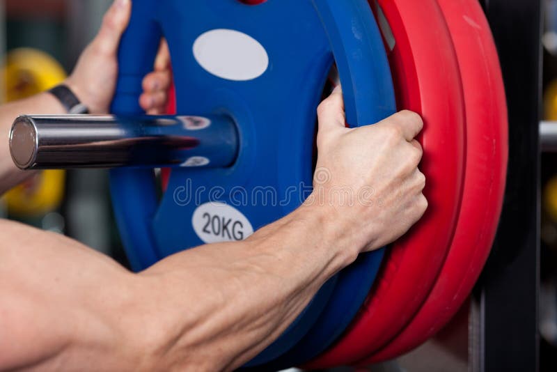 Man with plates stock photo. Image of lift, metal, muscular - 30682736