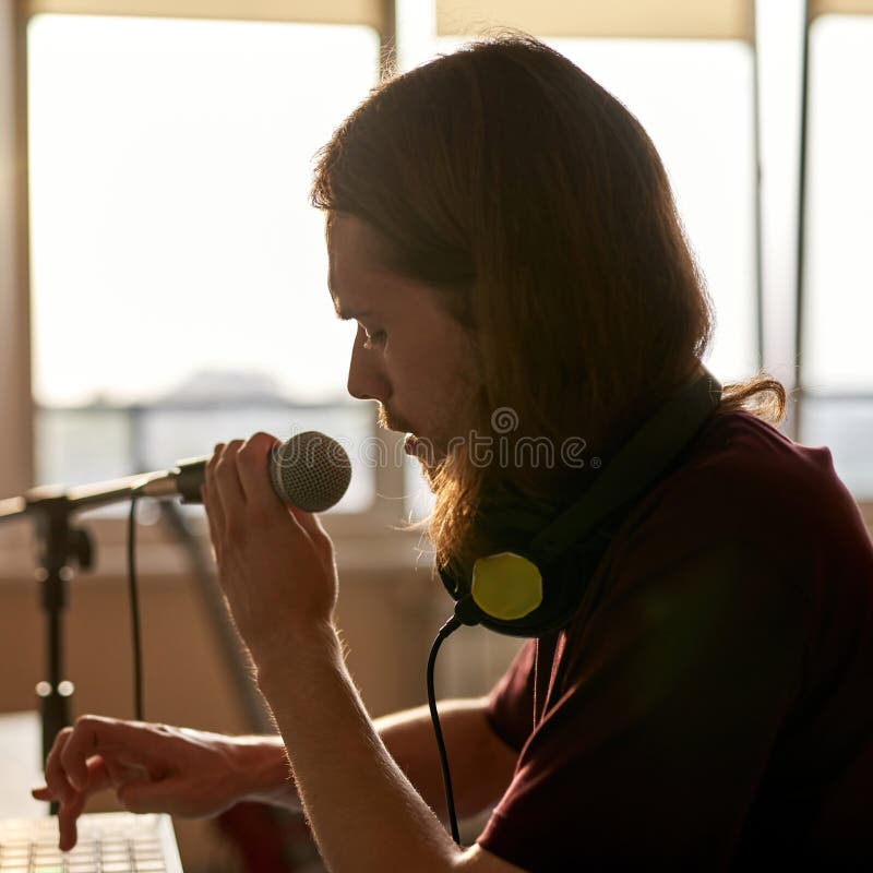 Man Play Music Controller and Sing in Microphone Stock Image - Image of ...