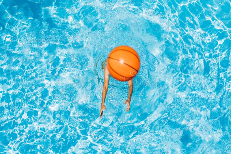 Man Play in the Pool with a Beach Ball Stock Image - Image of outdoors ...