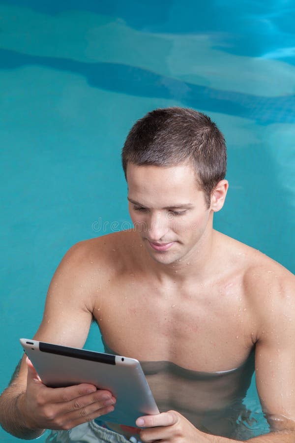 Man Play with a Tablet Inside the Pool Stock Photo - Image of internet ...