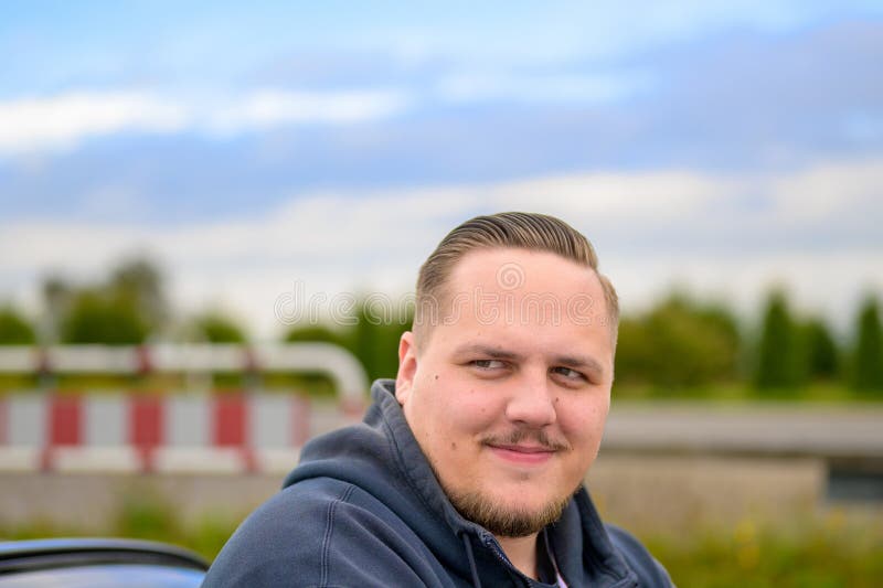 Man with Playful Glance Outdoors Stock Image - Image of stubble ...