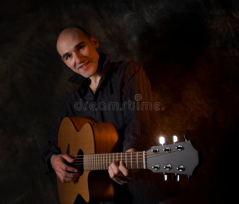 Man Playing Acoustic Guitar Stock Image - Image of guitarists ...