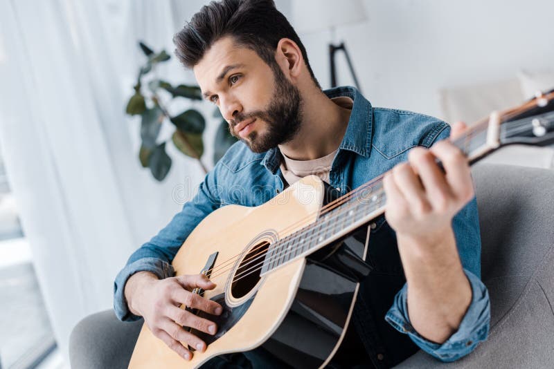 Man Playing Acoustic Guitar at Home Stock Image - Image of musician ...