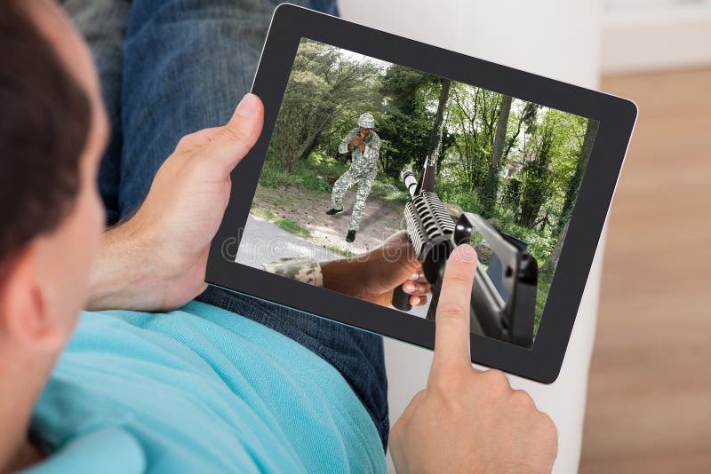 Boy Playing Action Game on Television Stock Photo - Image of holding ...