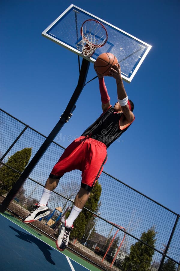 Man Playing Basketball stock photo. Image of athletic - 8985346