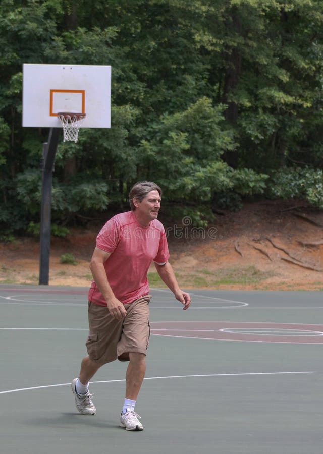 Man playing basketball 1 stock image. Image of practice - 55315995