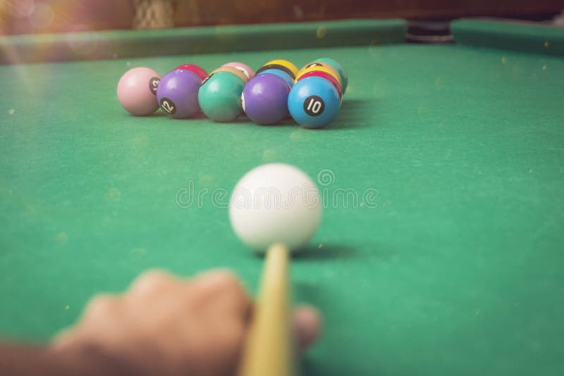 Man Playing Billiards in a Pool Table. Stock Photo - Image of game ...