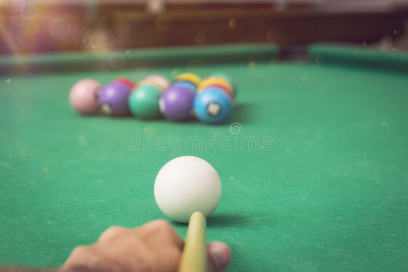 Man Playing Billiards in a Pool Table. Stock Photo - Image of game ...
