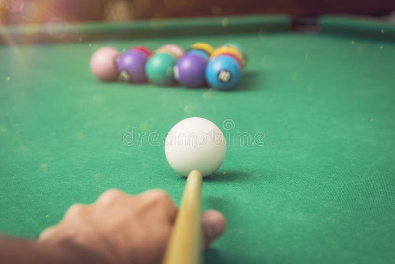 Man Playing Billiards in a Pool Table. Stock Photo - Image of aiming ...