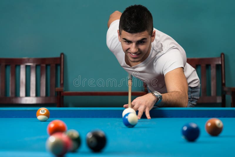 Man Playing Billiards stock photo. Image of relaxation - 37770510