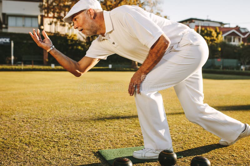 Man Playing Boules in a Playground Stock Image - Image of ball ...
