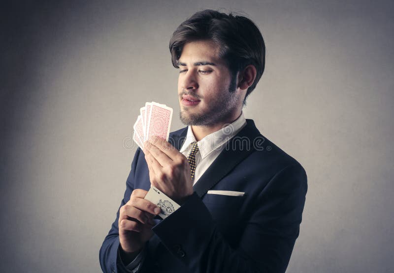 Man playing cards stock photo. Image of move, paper, elegant - 46717792