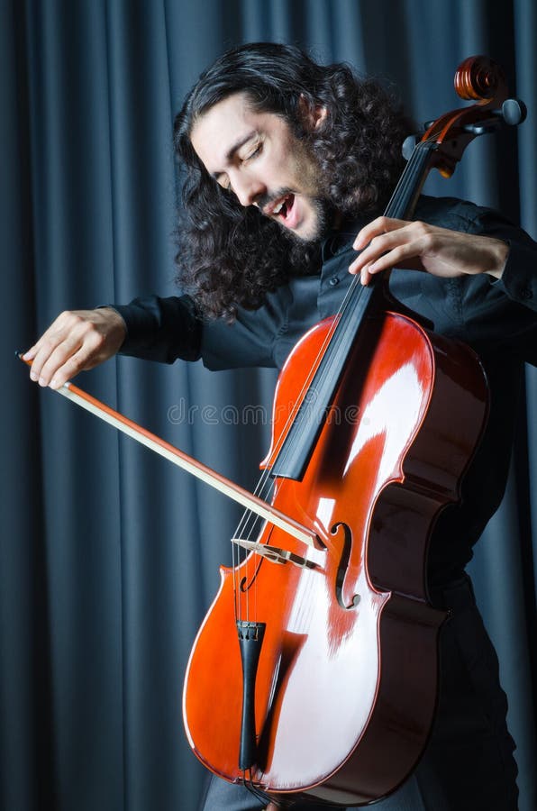 Man playing the cello stock photo. Image of background - 22408876