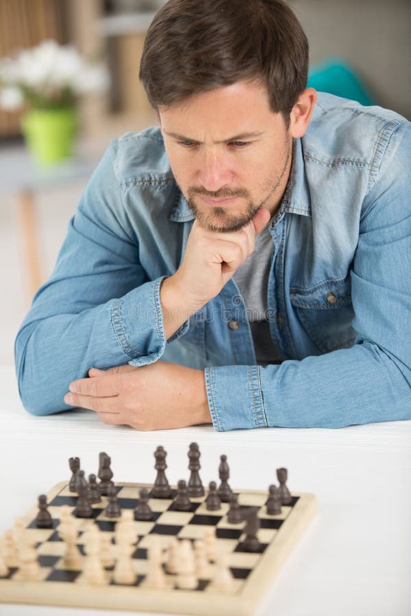 A man playing chess stock photo. Image of hobby, afro - 148031564