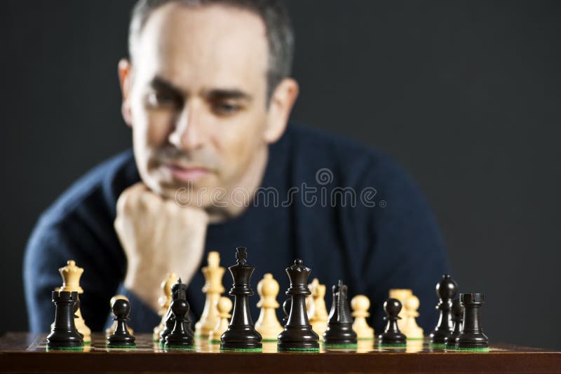 Man playing chess stock image. Image of hold, person - 15614727