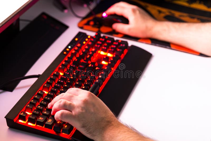 Man Playing Computer Game on Custom Made Desktop with Joypad, Keyboard ...