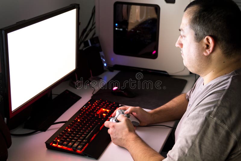 Man Playing Computer Game on Custom Made Desktop with Joypad, Ke Stock ...