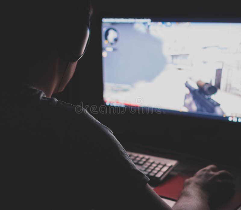 Man playing computer game. stock image. Image of back - 114281525