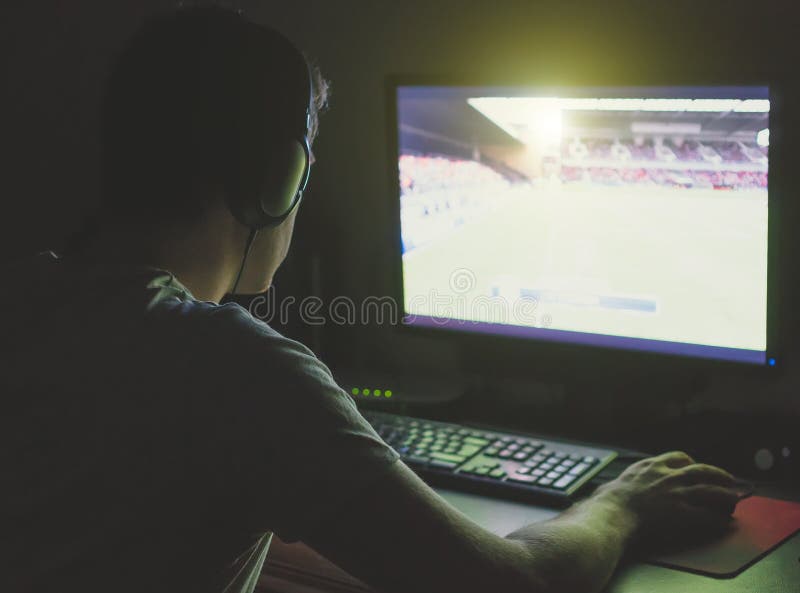 Man playing computer game. stock image. Image of headphones - 114281509