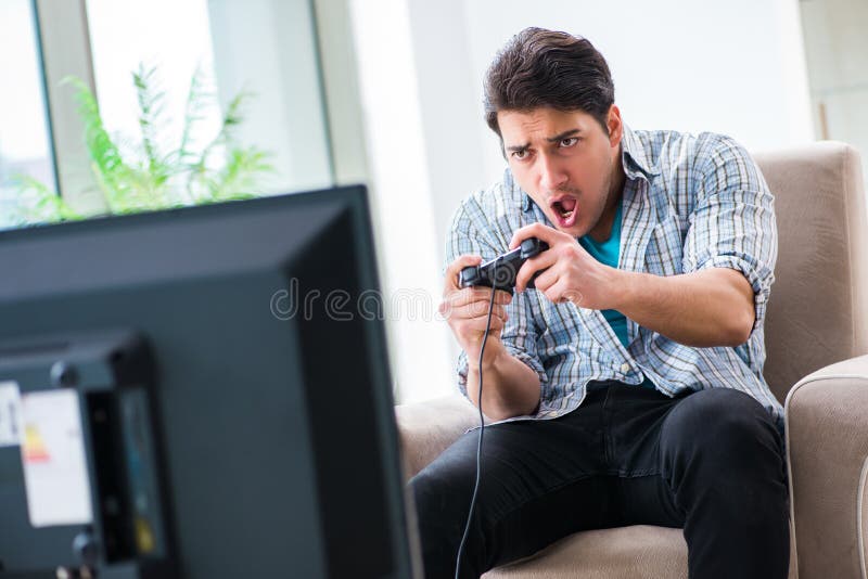 The Man Playing Computer Game at Home Stock Photo - Image of home, game ...